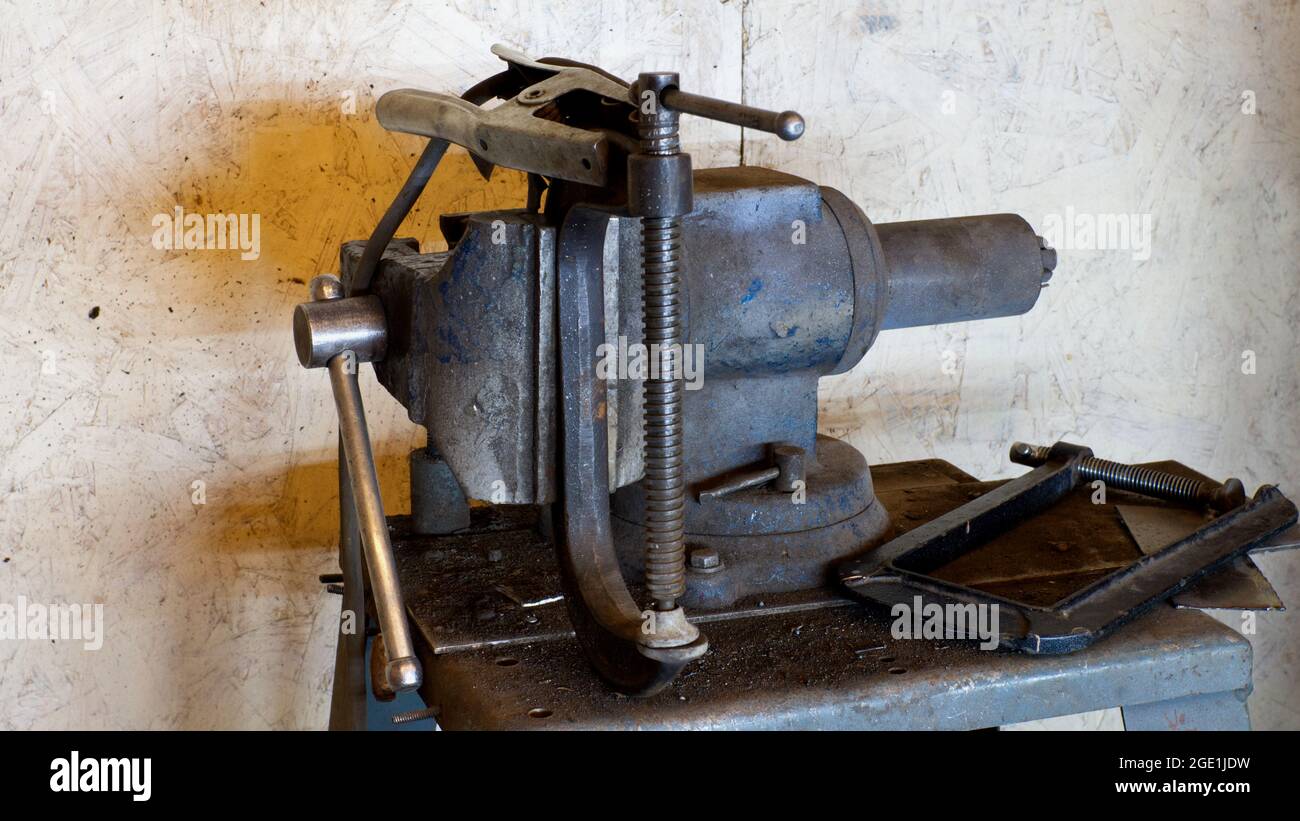 A Bench Vice, C Clamp, and Welding Ground Clamp in a Workshop Stock ...