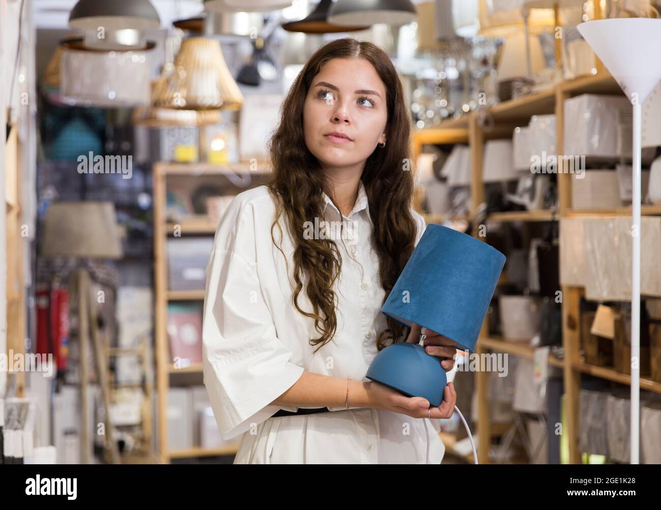 Ordinary female choosing new hi-res stock photography and images - Alamy