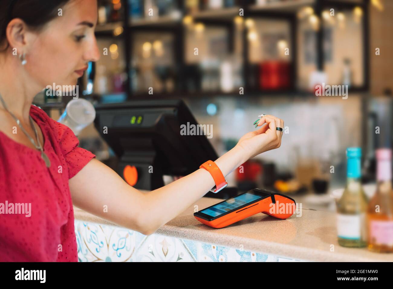 Female pay smart watch hi-res stock photography and images - Alamy