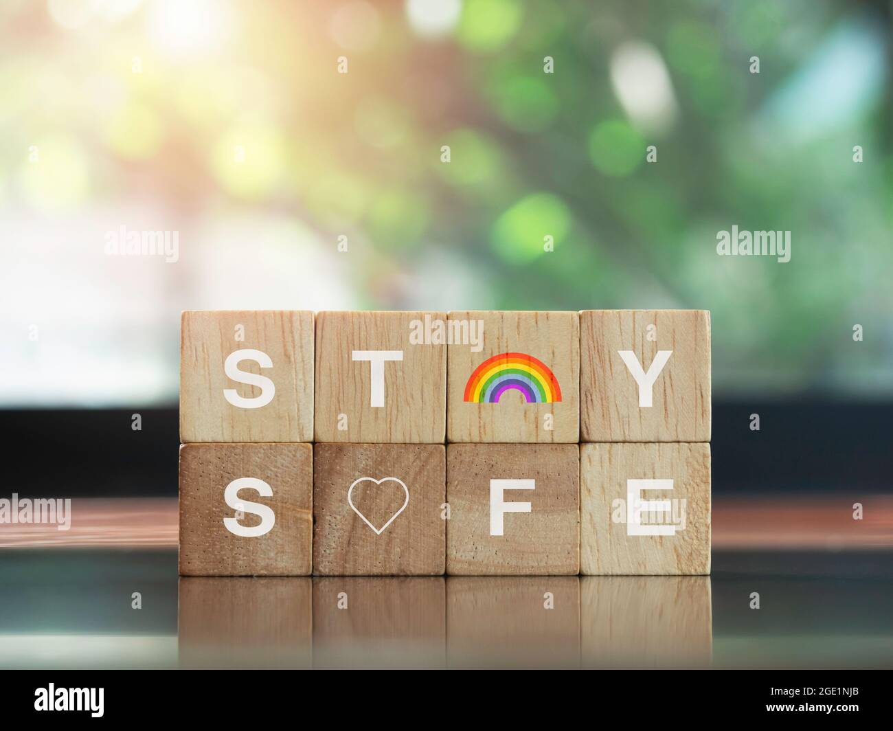 Stay safe concept. Word "Stay Safe" with rainbow and heart icon on ...