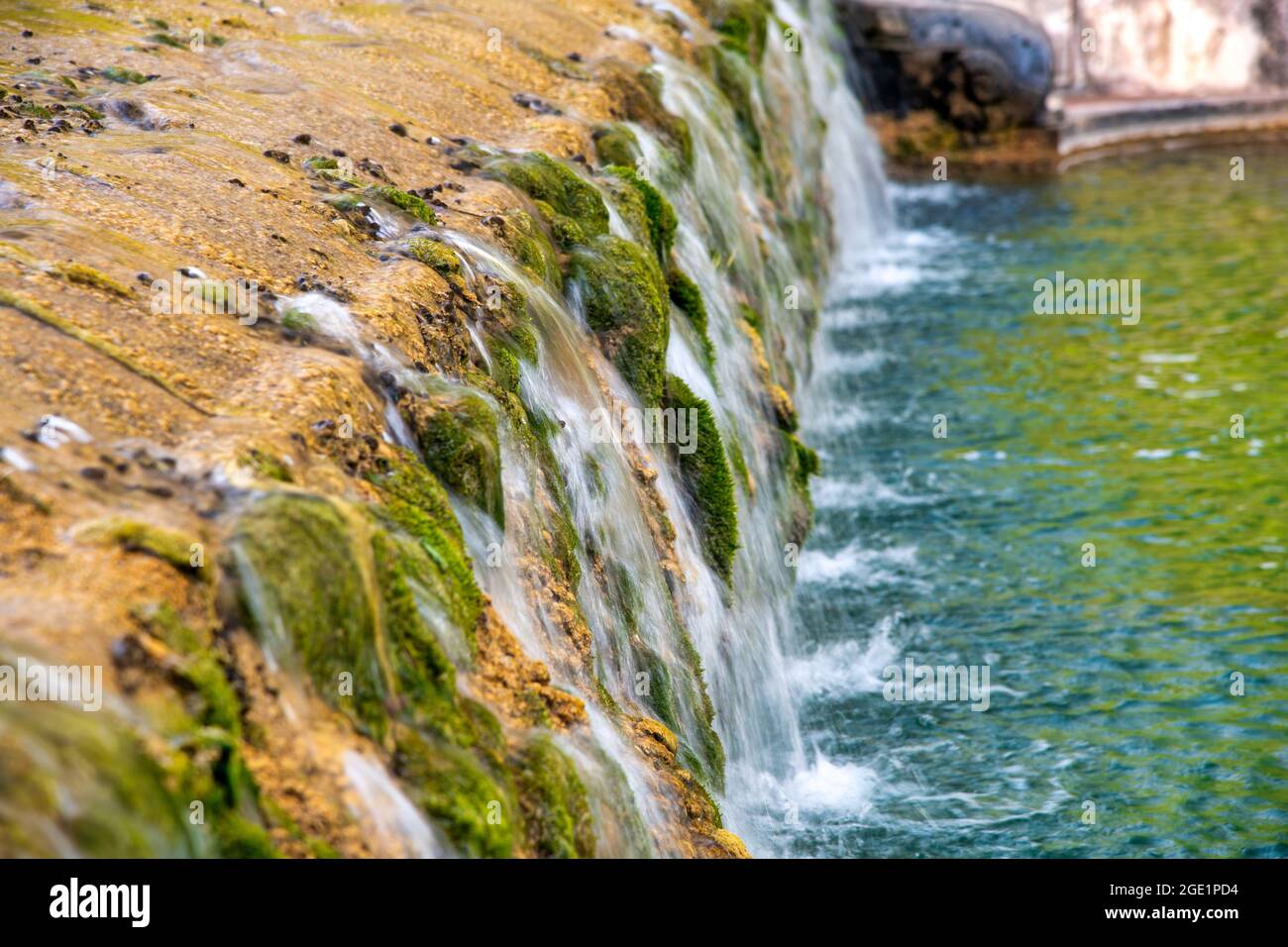 Closeup of a water passage flowing into a reservoir Stock Photo - Alamy