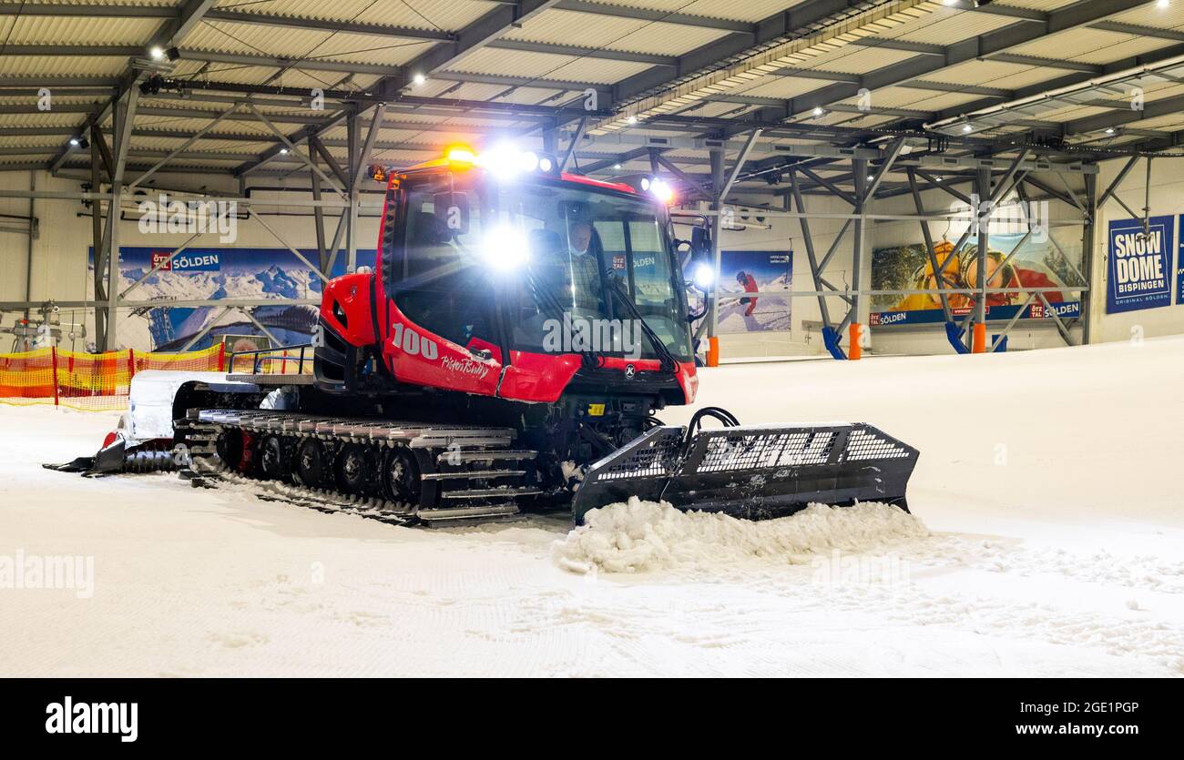 Bispingen, Germany. 27th July, 2021. A Pistenbully drives through the ...