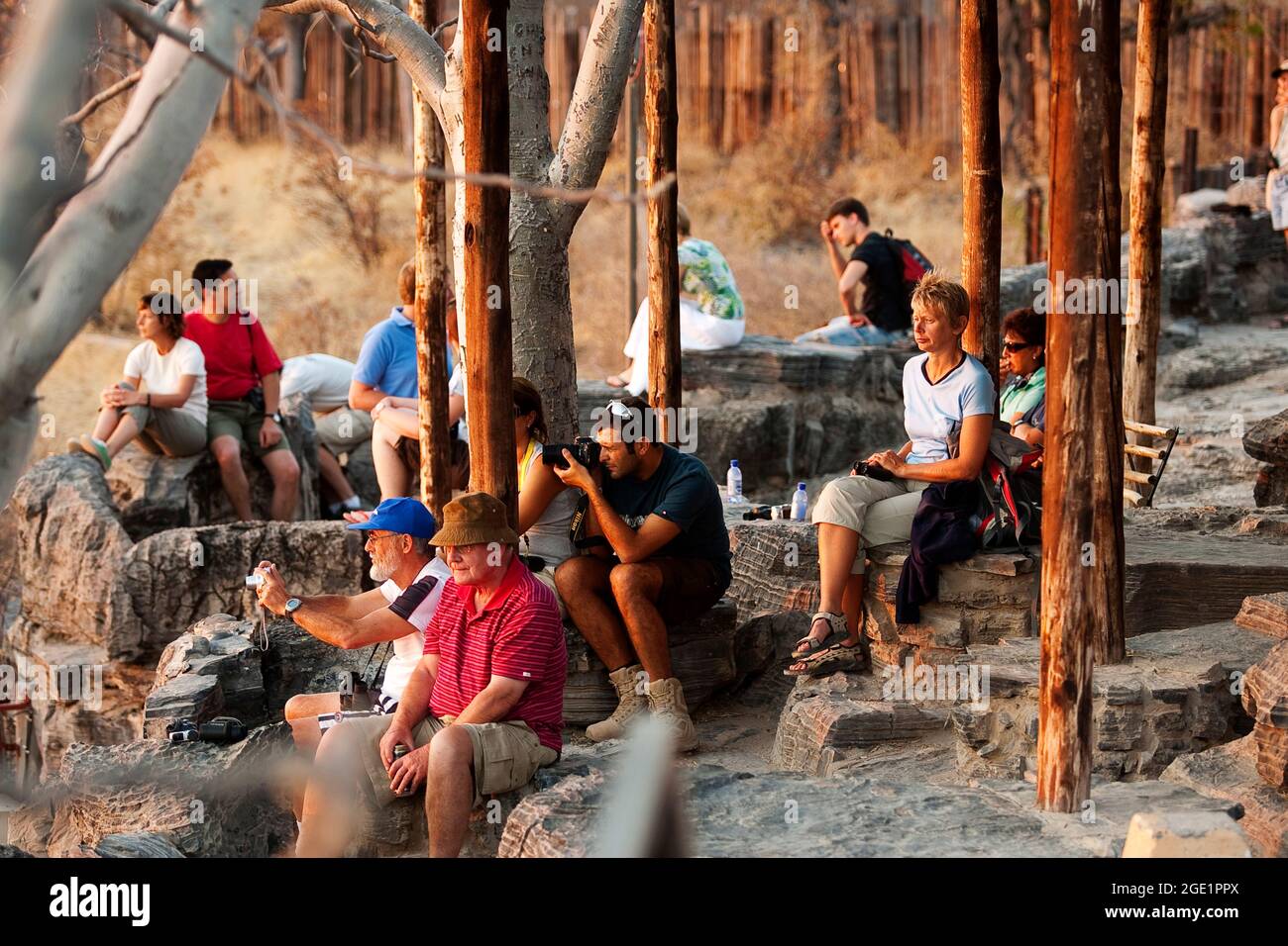 Tourists waiting for wildlife to appear at Moringa waterhole, Halali ...