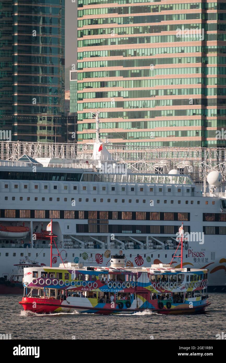 The 'Night Star', one of the Star Ferry fleet, crosses Victoria Harbour ...