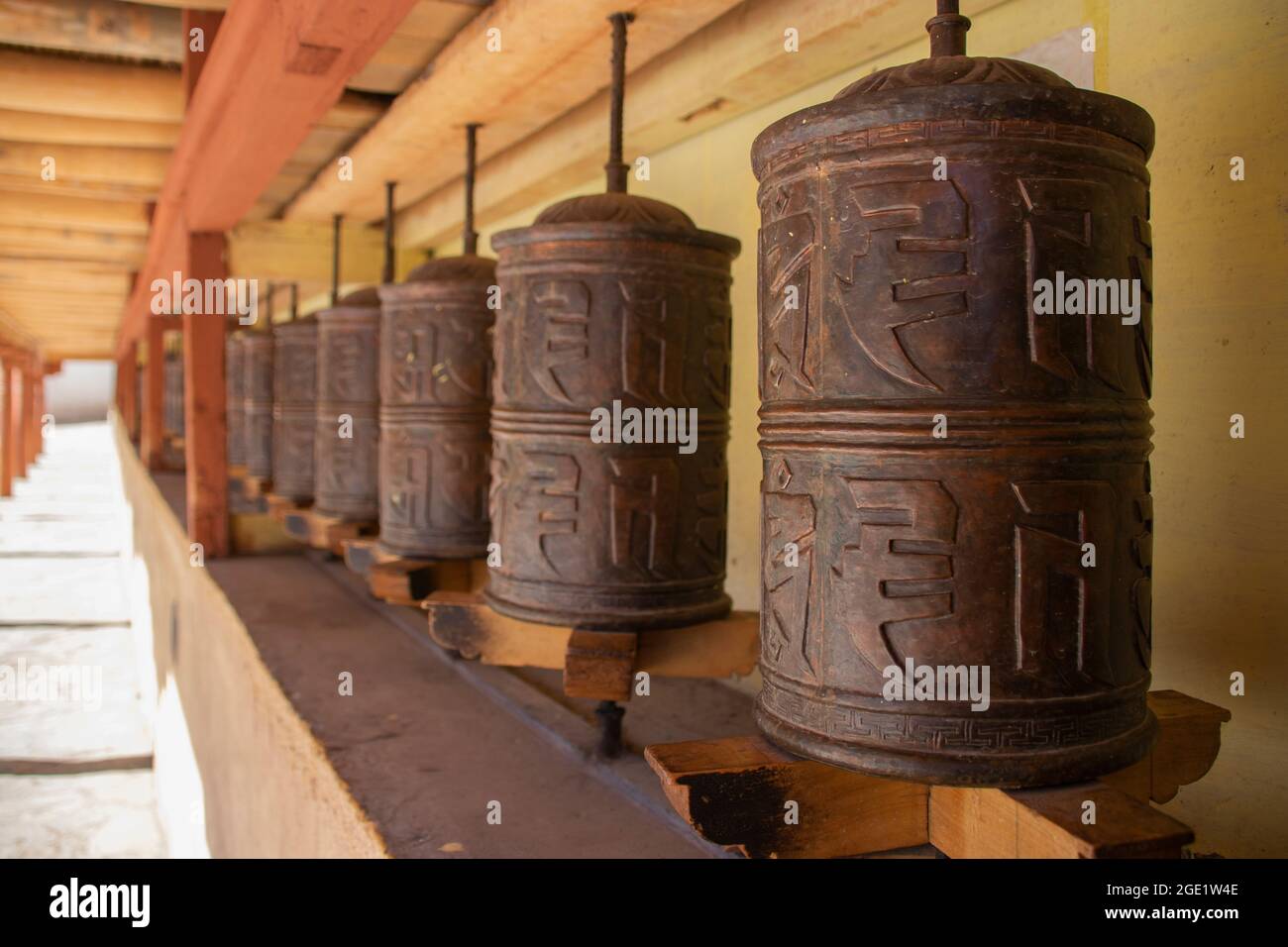Praying Wheel in Buddhism Stock Photo - Alamy