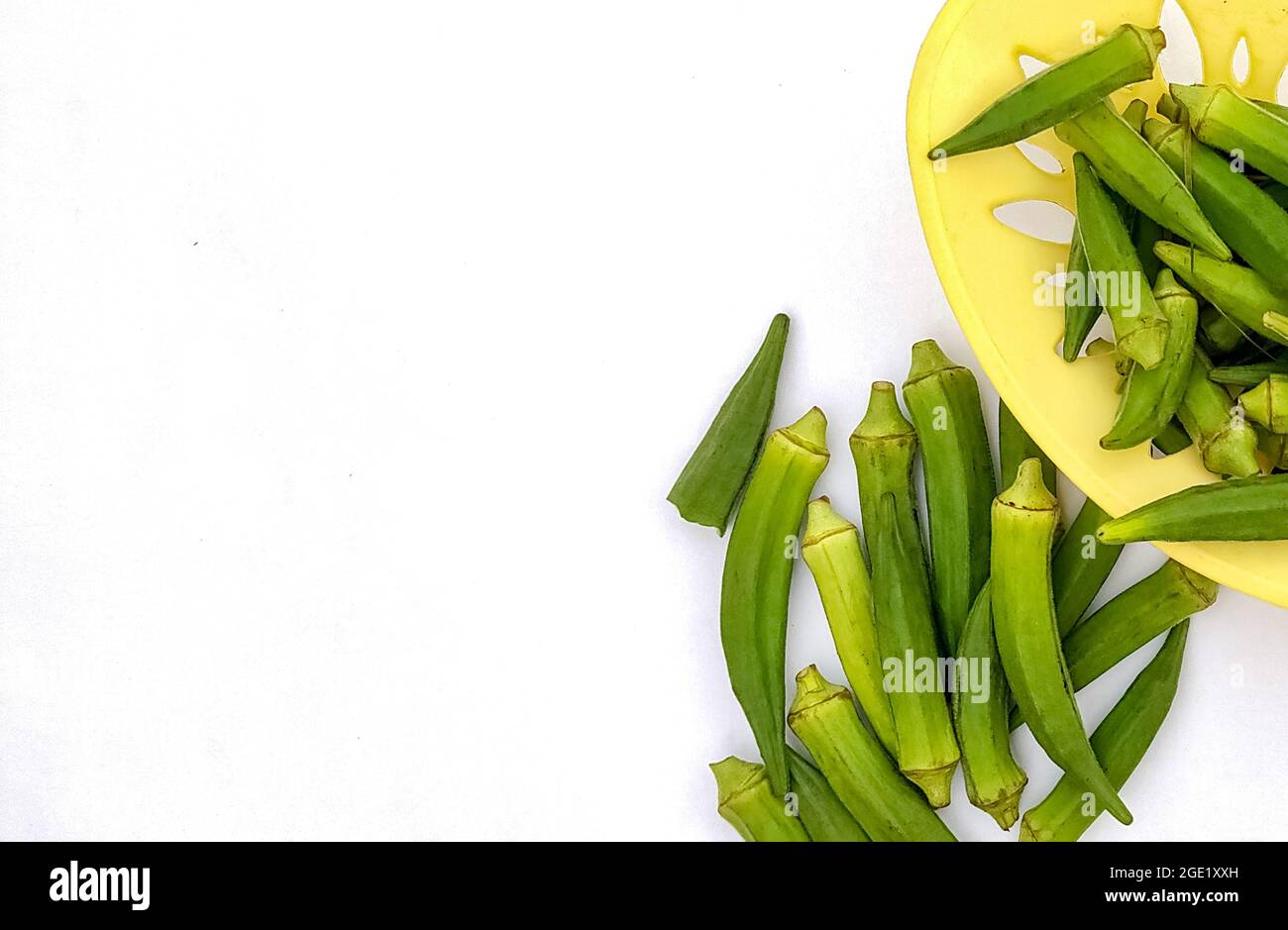 Raw okra or ladyfingers isolated on white background Stock Photo - Alamy