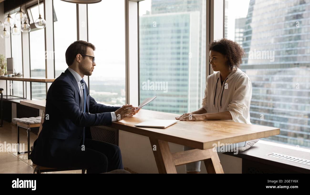 Interview two people african american hi-res stock photography and ...