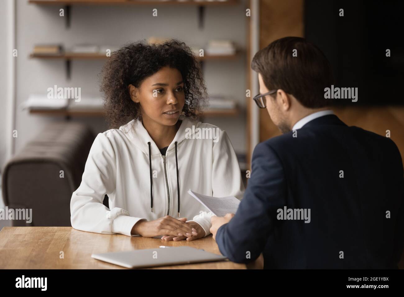 Young attractive African ethnicity female applicant pass job interview ...