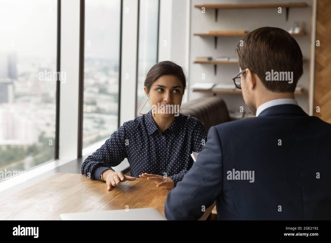 Young attractive Indian ethnicity female applicant pass job interview ...