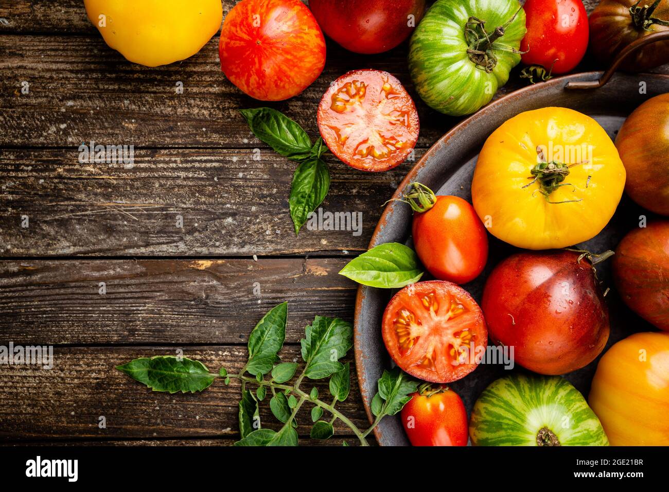 Mixed tomatoes top view. Composition with variety of colorful fresh ...