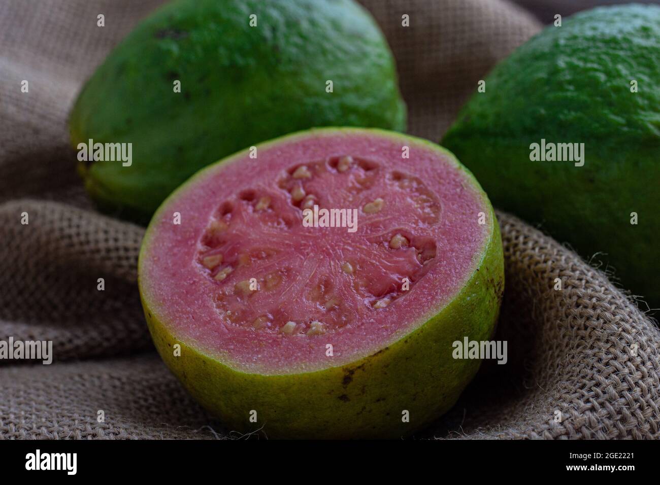 Pink guava fruit sliced in half Stock Photo - Alamy