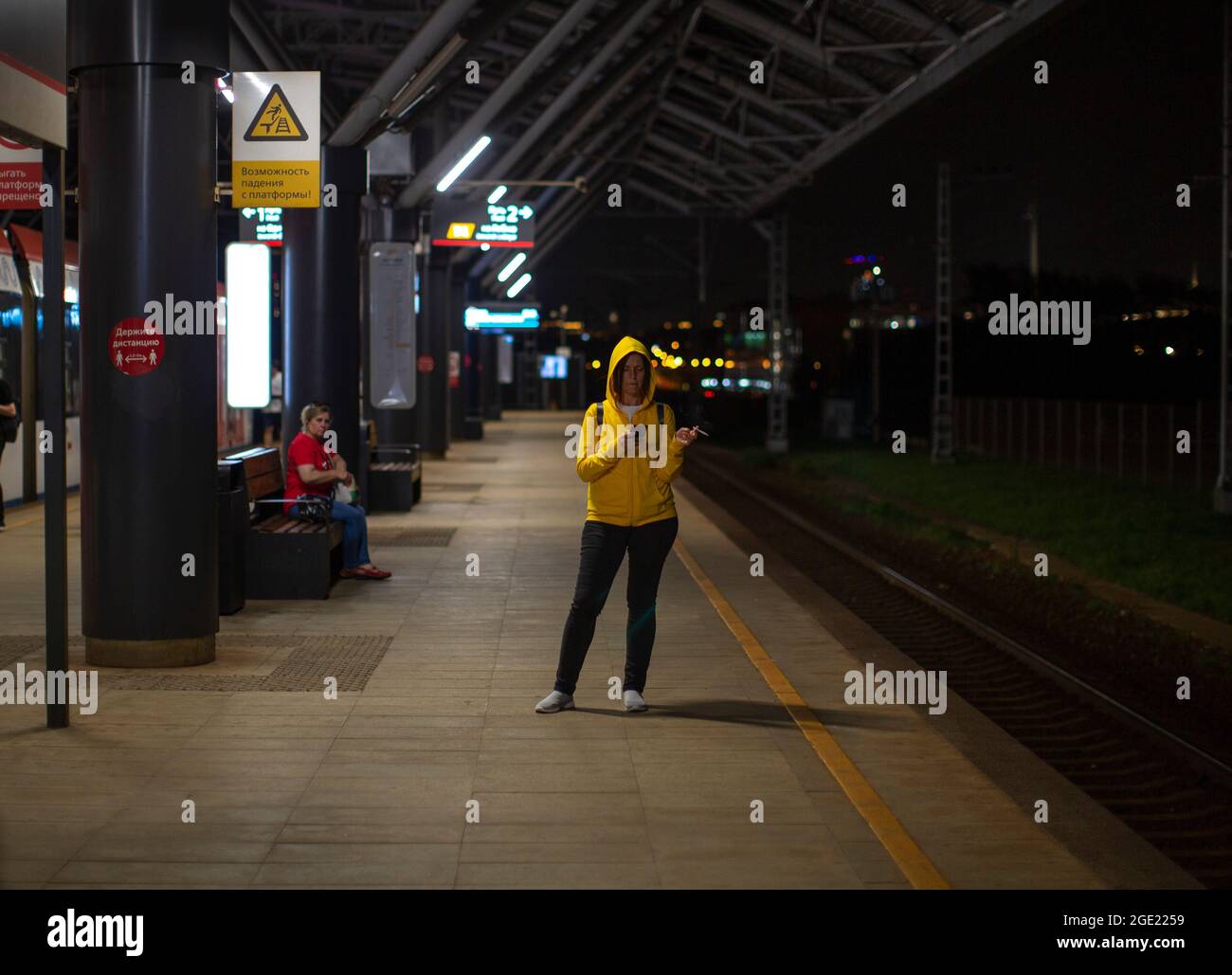Lady in Yellow Stock Photo - Alamy