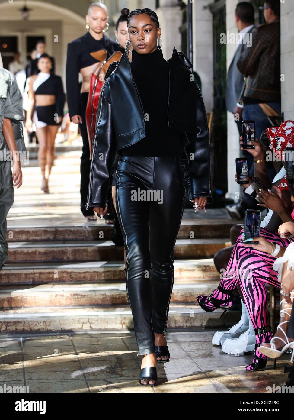 LOS ANGELES, CALIFORNIA, USA - AUGUST 15: A model walks the runway at ...