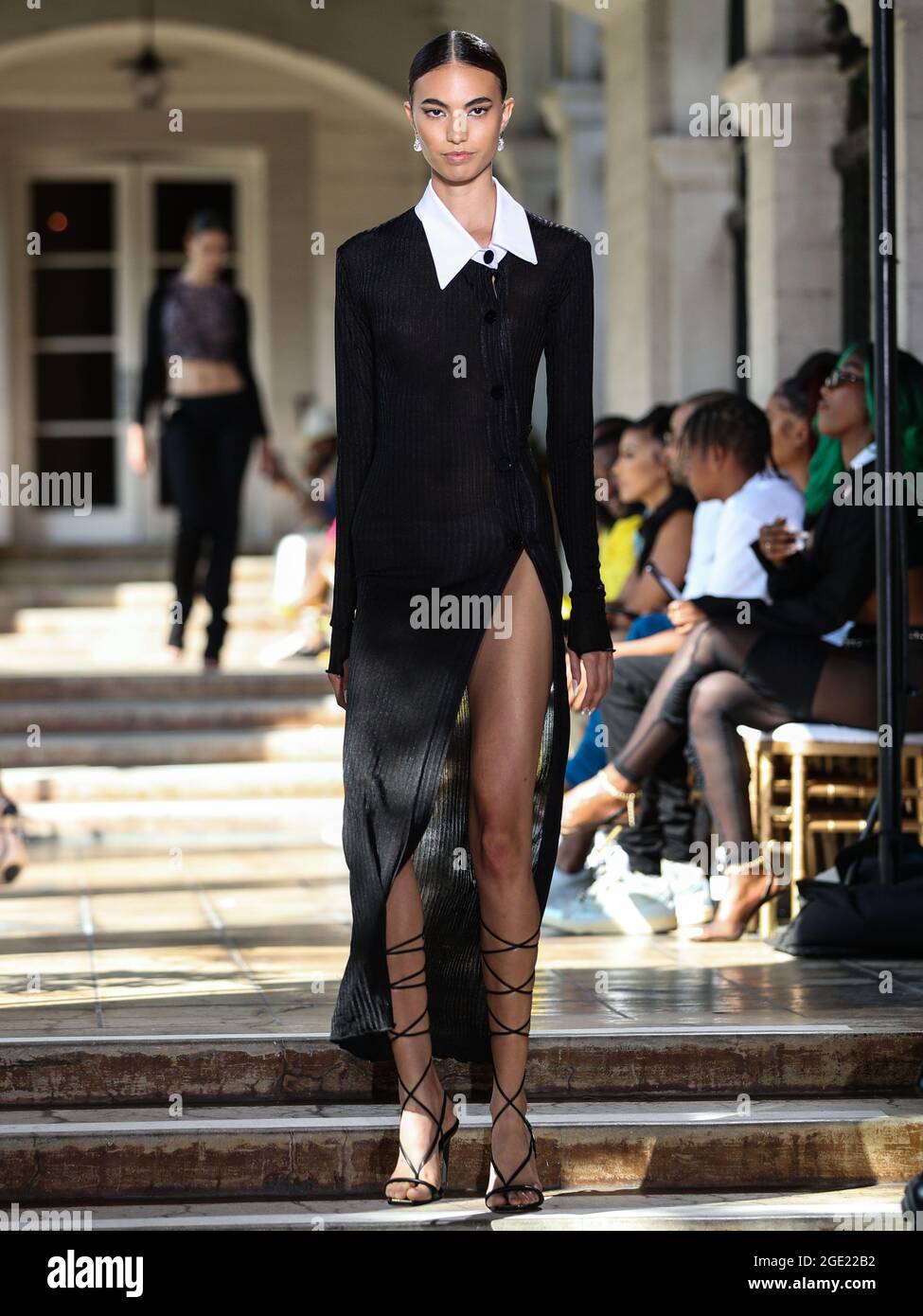 LOS ANGELES, CALIFORNIA, USA - AUGUST 15: A model walks the runway at ...