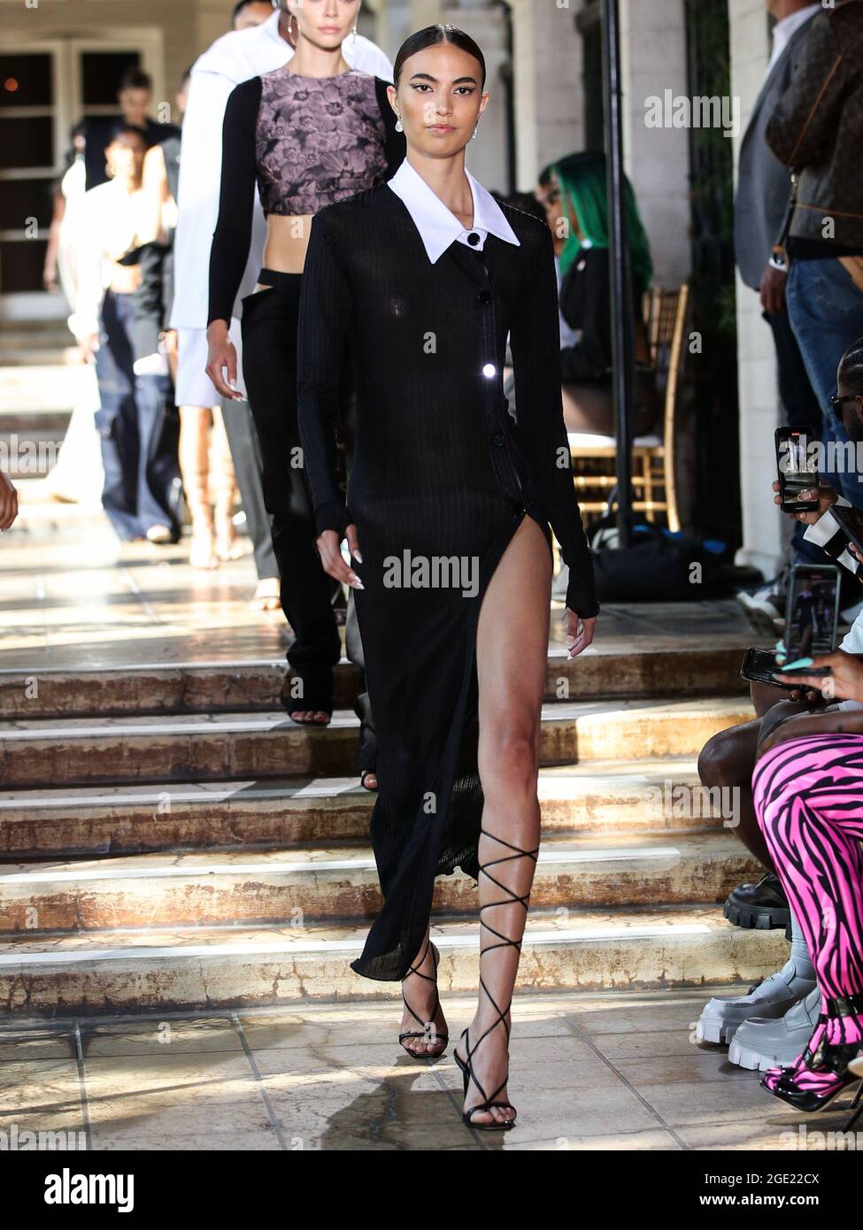 LOS ANGELES, CALIFORNIA, USA - AUGUST 15: A model walks the runway at ...