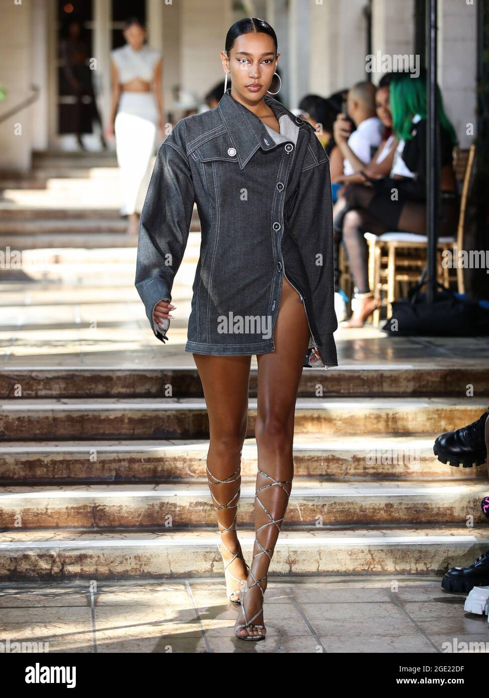 LOS ANGELES, CALIFORNIA, USA - AUGUST 15: A model walks the runway at ...