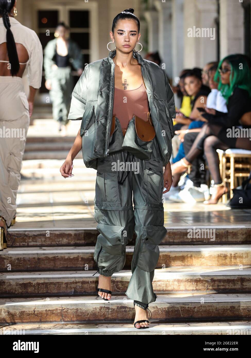 LOS ANGELES, CALIFORNIA, USA - AUGUST 15: A model walks the runway at ...