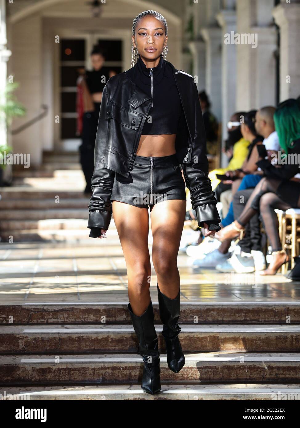 LOS ANGELES, CALIFORNIA, USA - AUGUST 15: A model walks the runway at ...