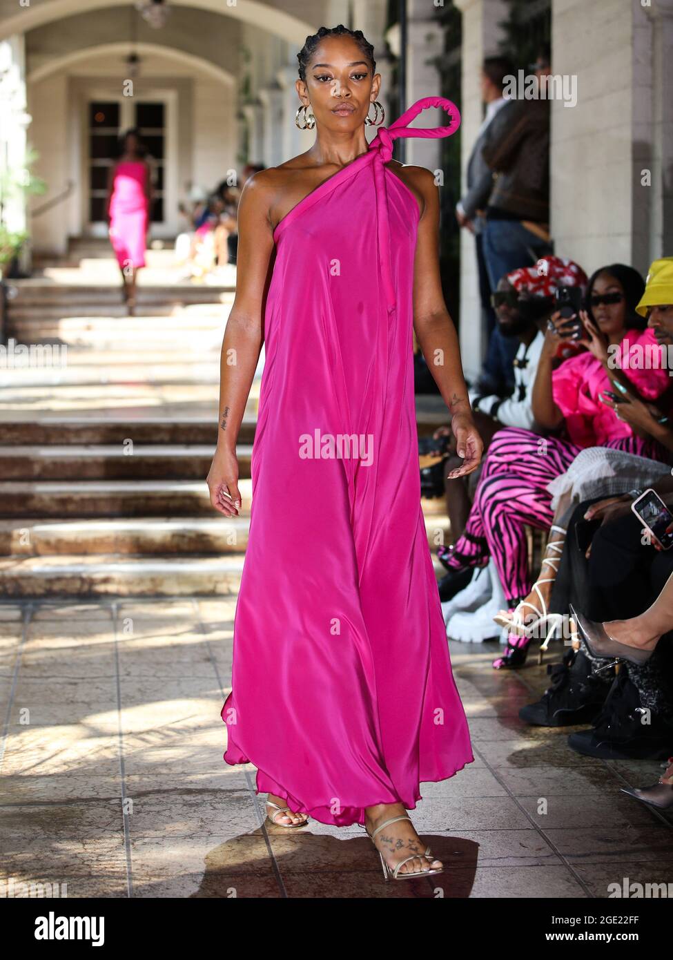 LOS ANGELES, CALIFORNIA, USA - AUGUST 15: A model walks the runway at ...