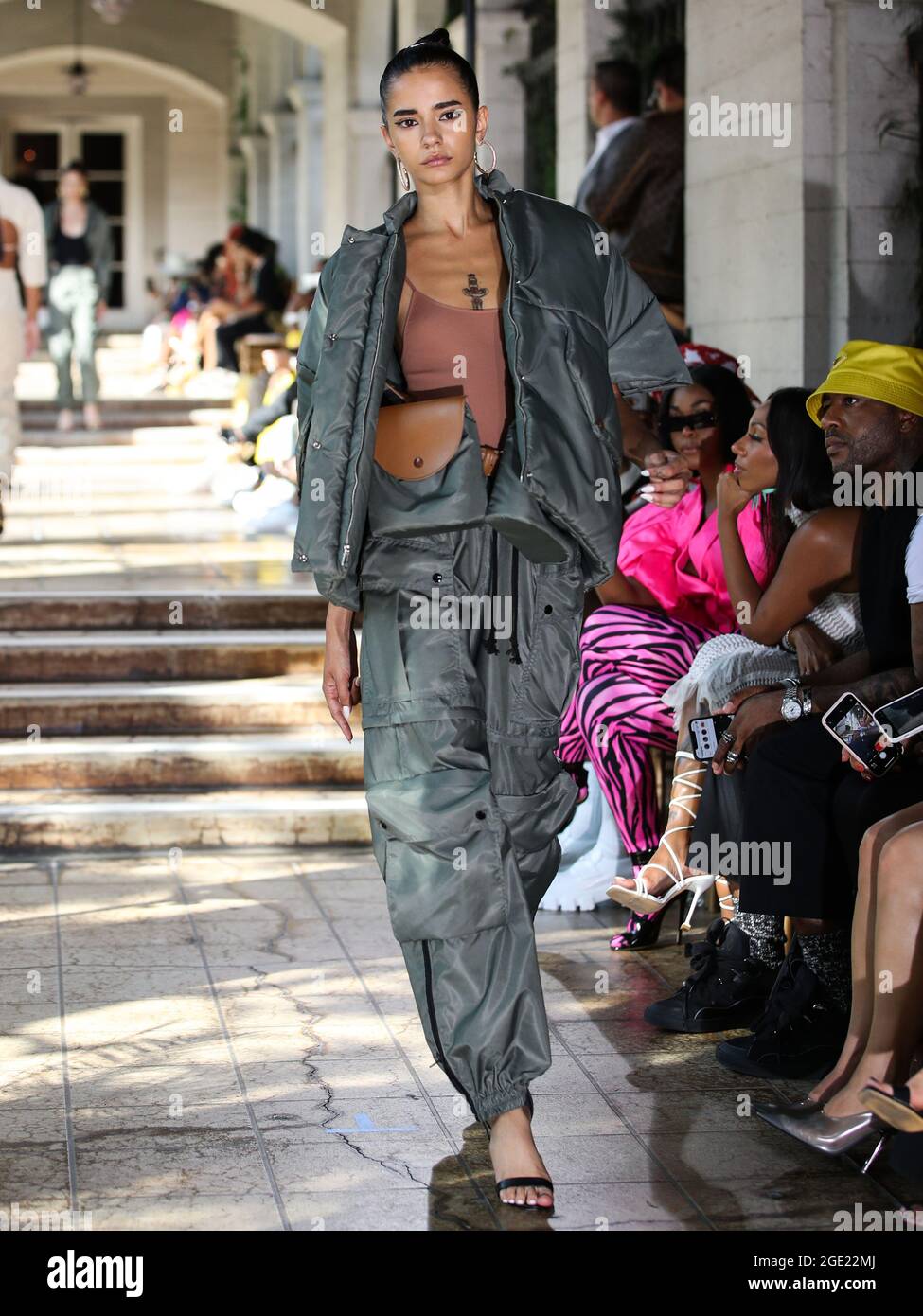 LOS ANGELES, CALIFORNIA, USA - AUGUST 15: A model walks the runway at ...