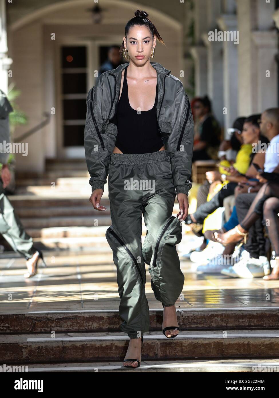LOS ANGELES, CALIFORNIA, USA - AUGUST 15: A model walks the runway at ...