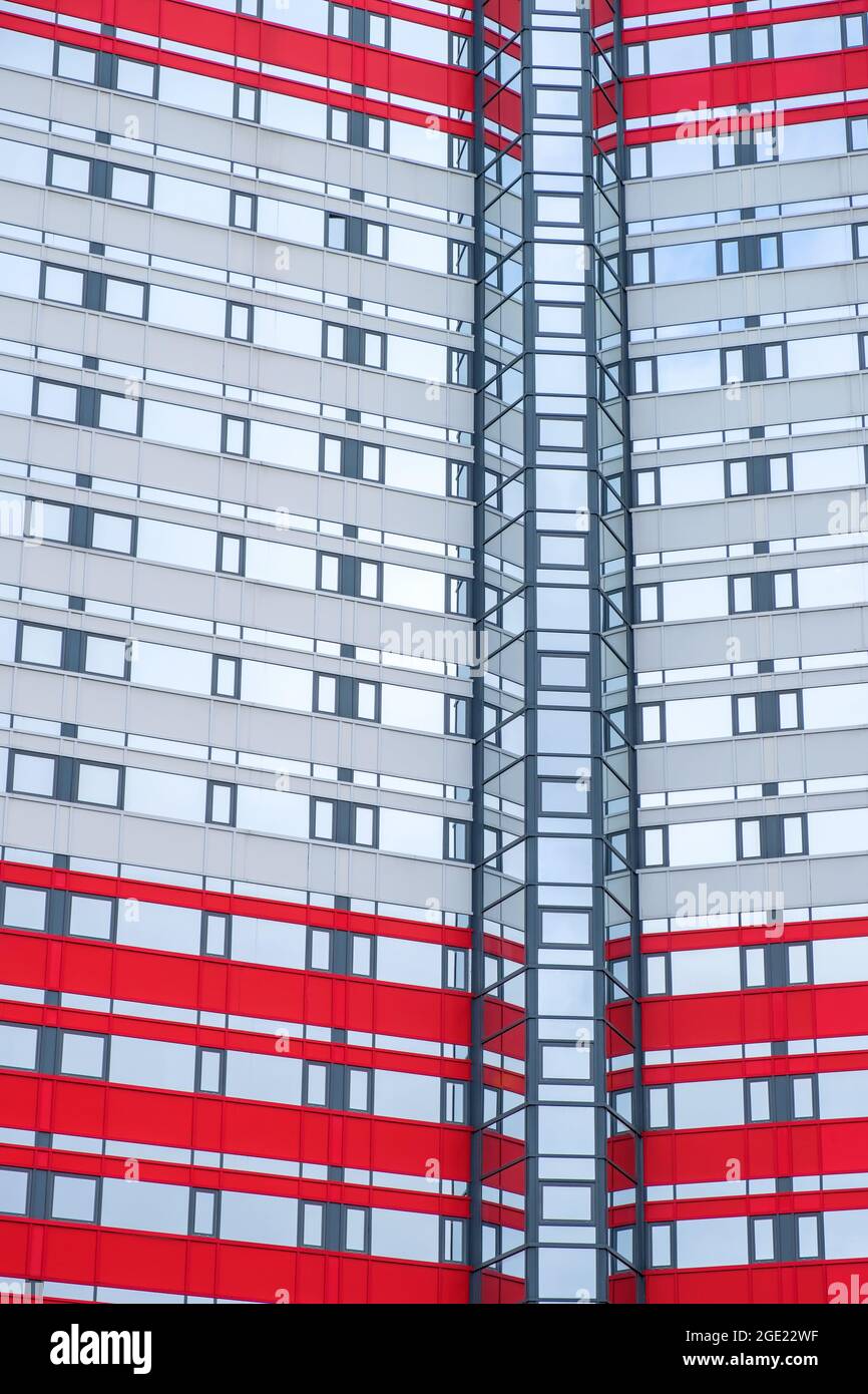 Red and white office building Stock Photo - Alamy