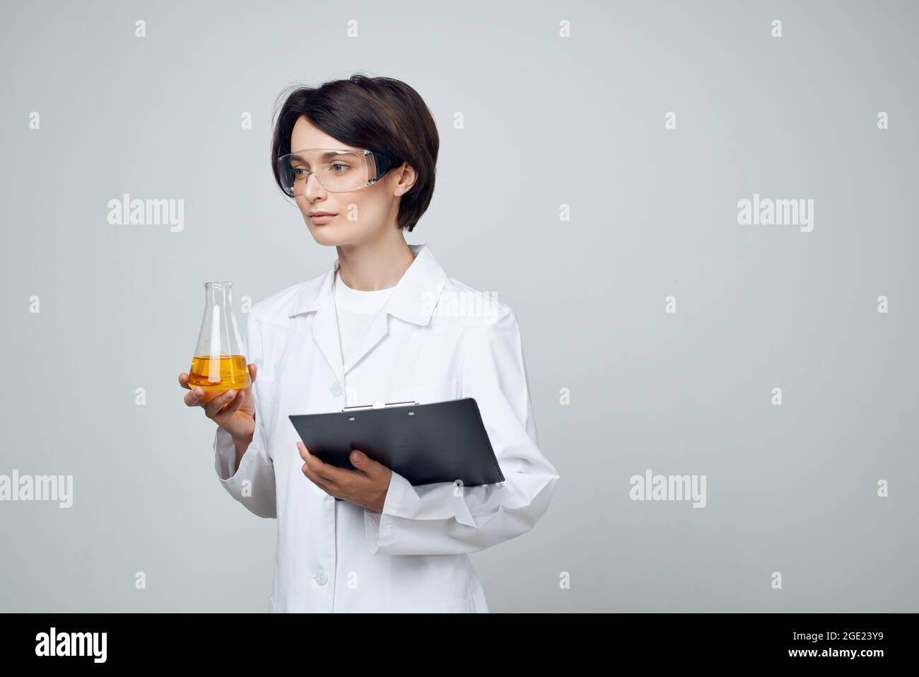 female doctor tests as part of chemistry research Stock Photo - Alamy