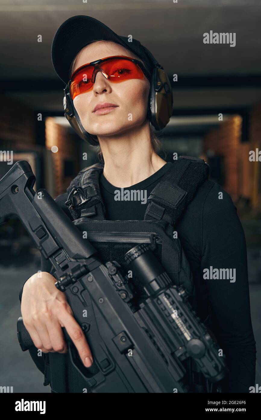 Posing shooter hi-res stock photography and images - Alamy