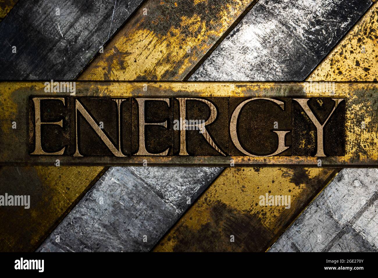 Energy text on vintage textured copper and gold background Stock Photo ...