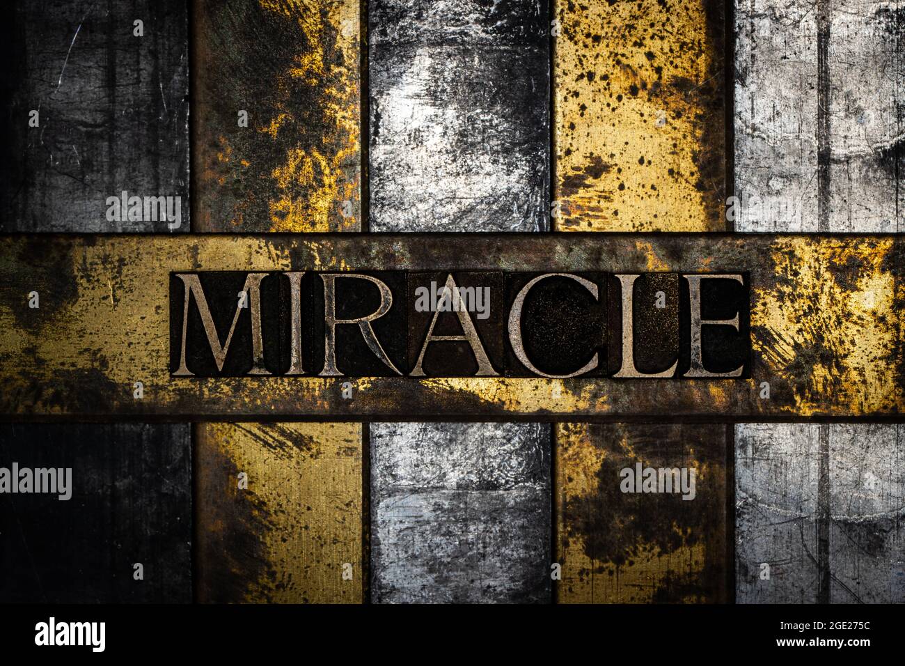 Miracle text message on textured grunge copper and vintage gold ...