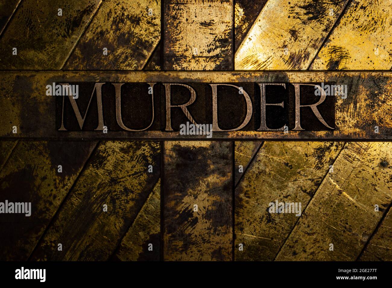 Murder text on vintage textured silver grunge copper and gold ...