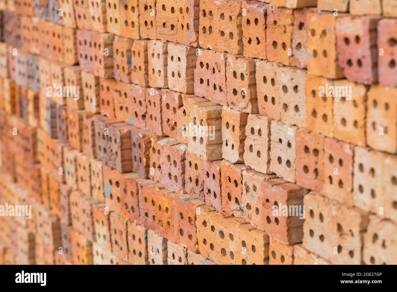 Red brick block for wallpaper and background Stock Photo - Alamy