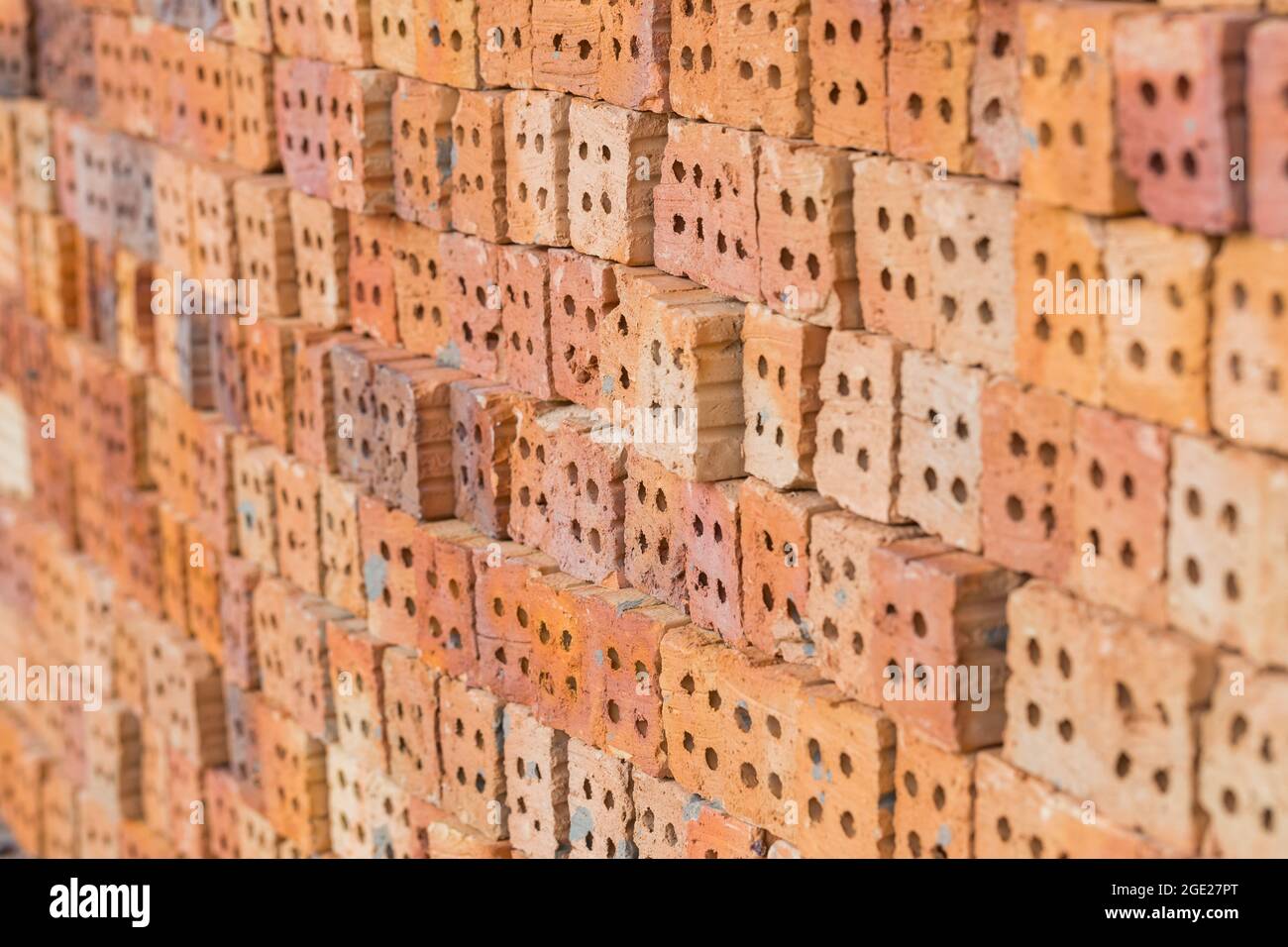 Red brick block for wallpaper and background Stock Photo - Alamy