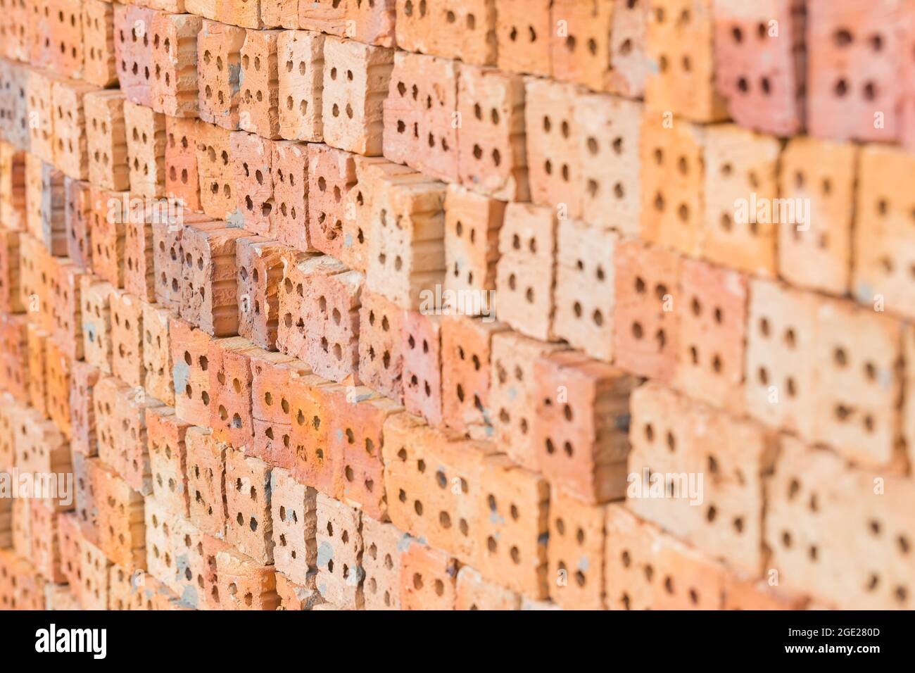 Red brick block for wallpaper and background Stock Photo - Alamy