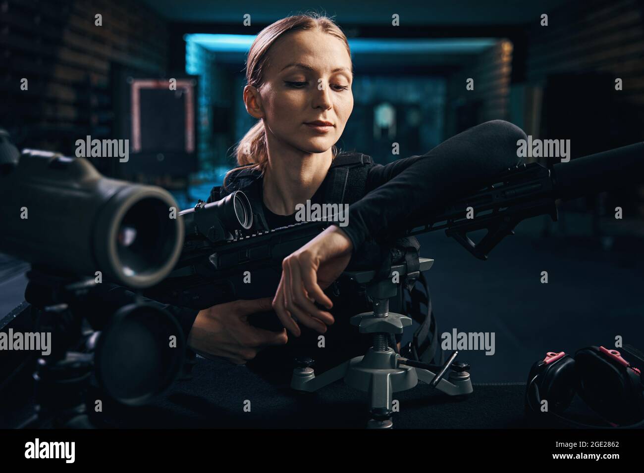 Seated shooter hi-res stock photography and images - Alamy