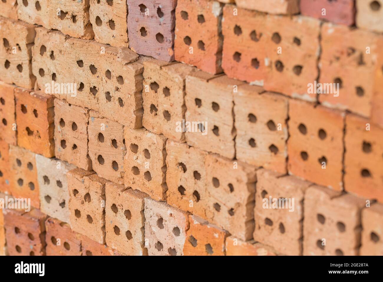 Red brick block for wallpaper and background Stock Photo - Alamy