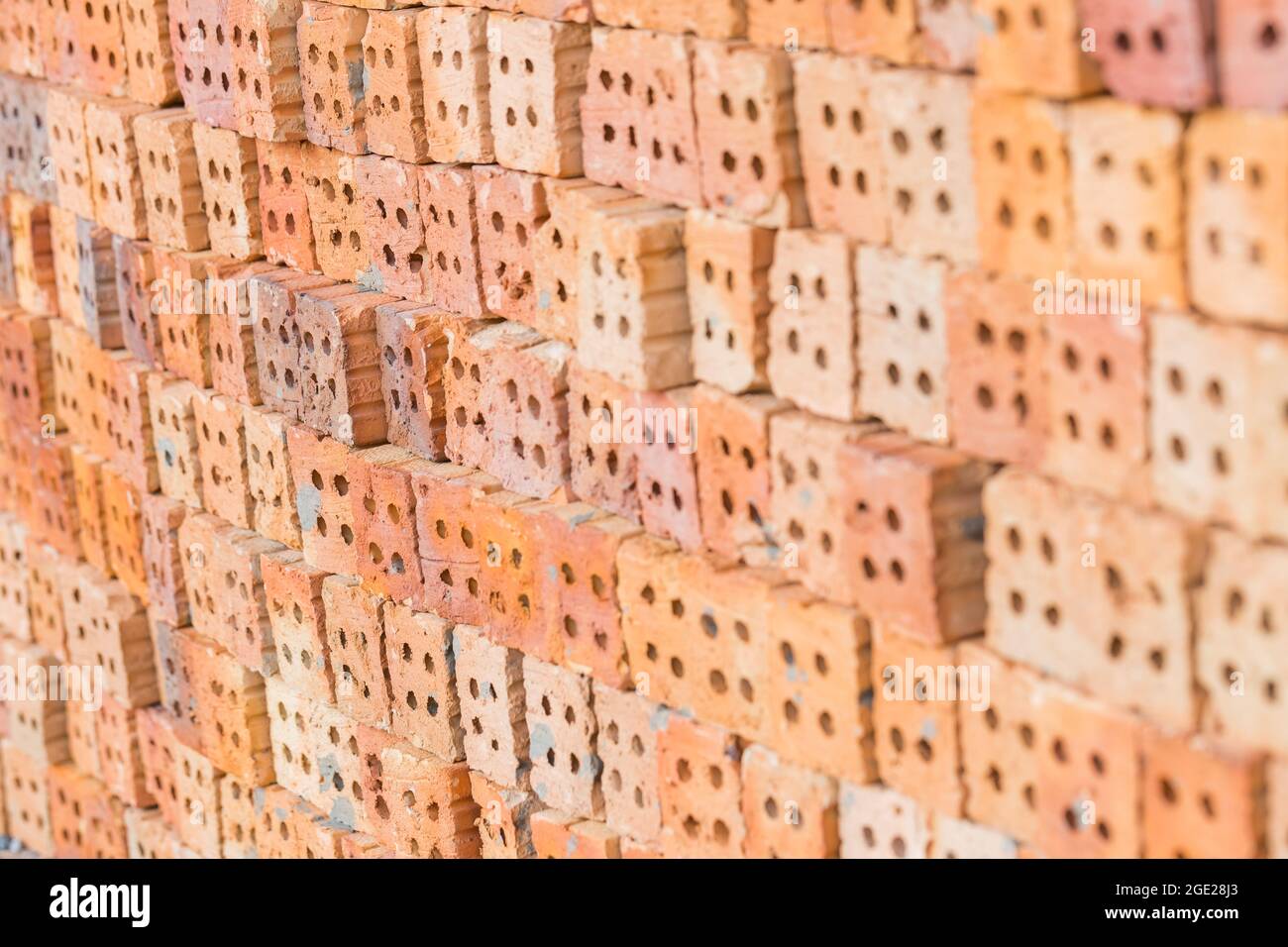 Red brick block for wallpaper and background Stock Photo - Alamy
