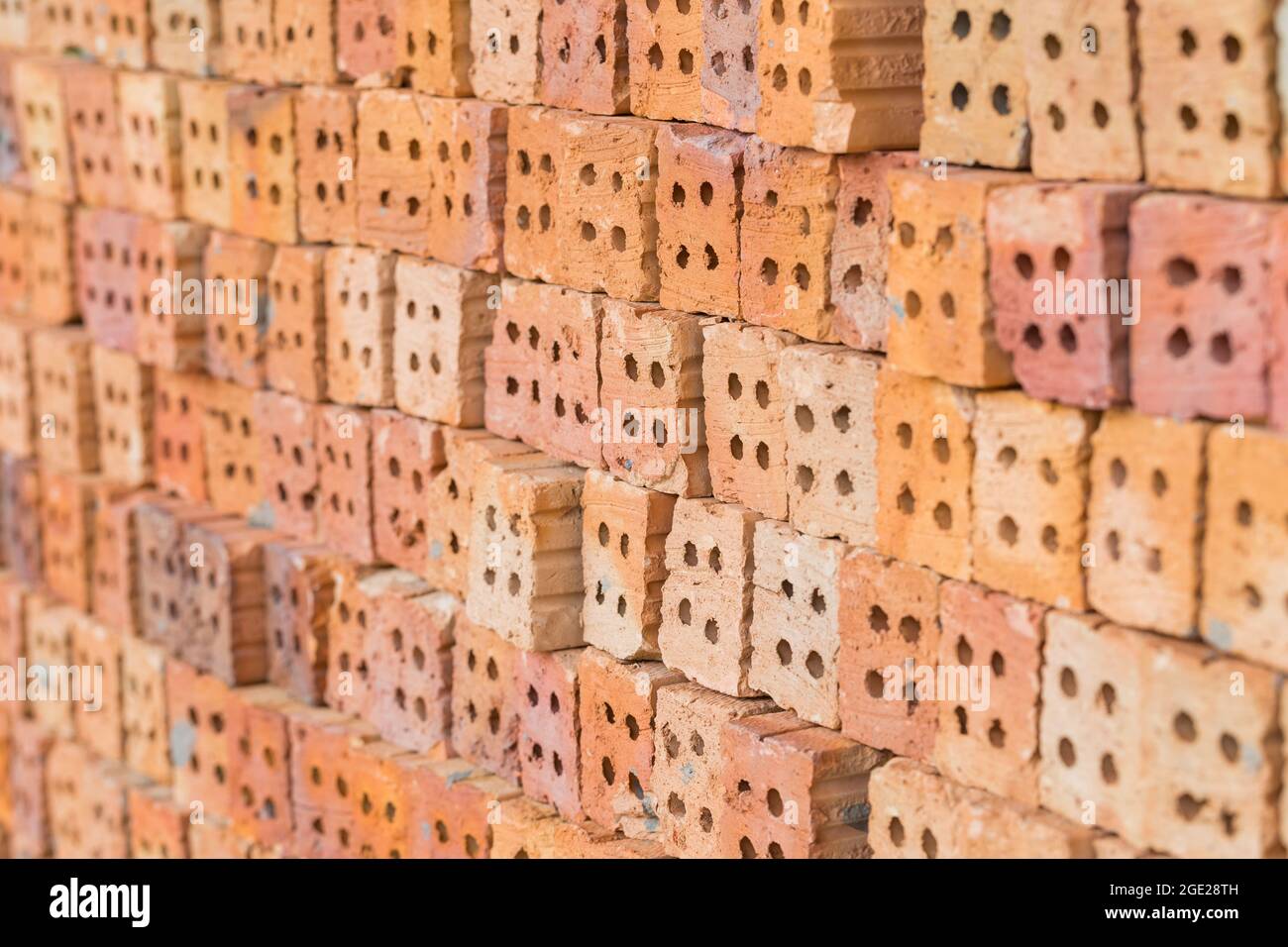 Red brick block for wallpaper and background Stock Photo - Alamy
