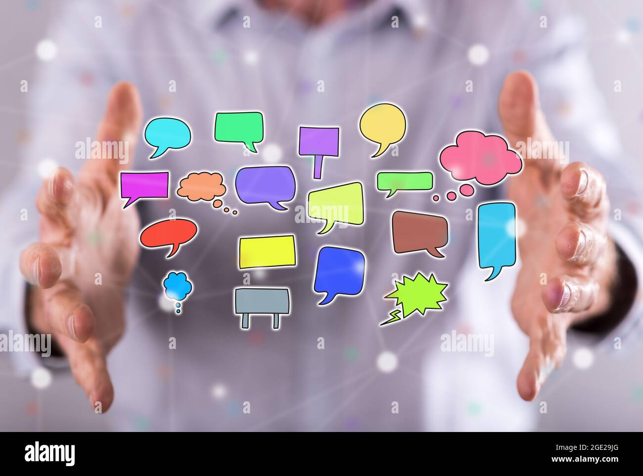 Communication concept between hands of a man in background Stock Photo ...