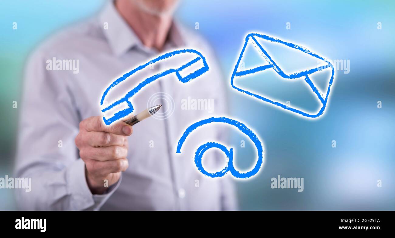 Man touching a contact concept on a touch screen with a pen Stock Photo ...