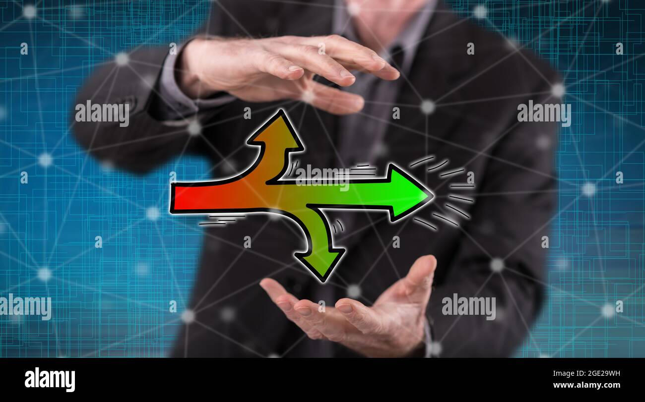 Right direction concept between hands of a man in background Stock ...