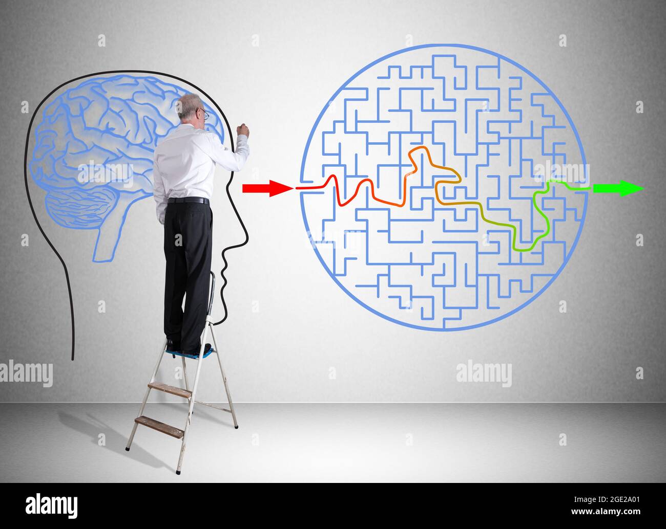 Man on a ladder drawing problem and solution concept on a wall Stock ...
