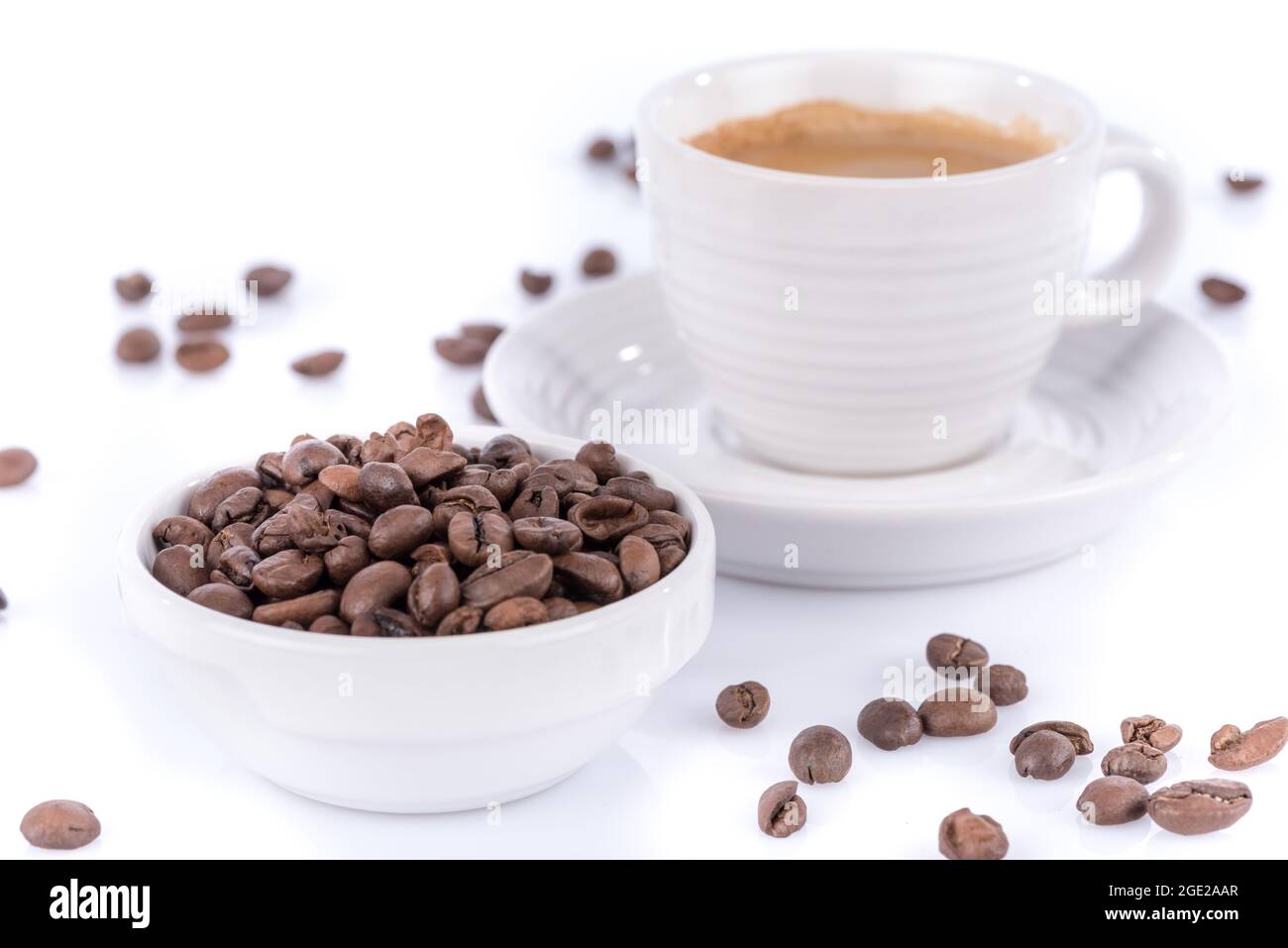 Expresso and coffee beans, isolated on white Stock Photo - Alamy