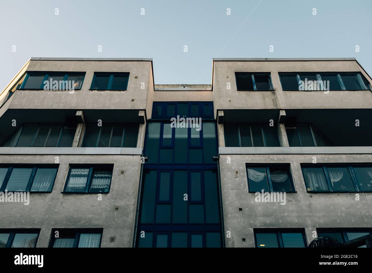 Low angle shot of an apartment building with dirty exterior walls Stock ...