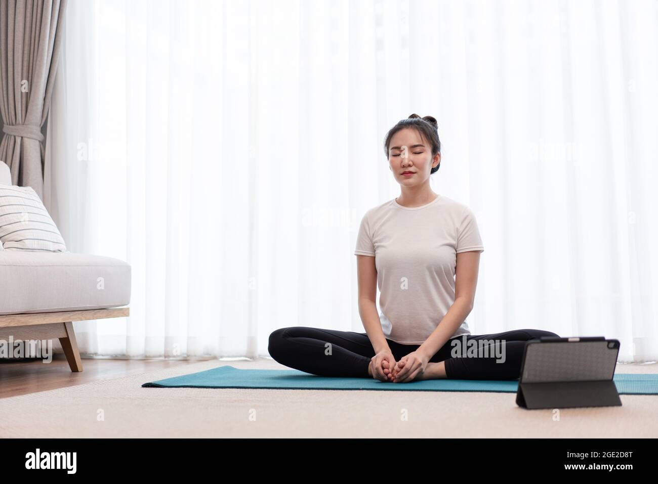 Productive activity concept a calm girl concentrating on meditating ...