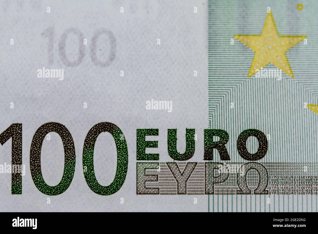 detail of 100 euro banknote on wooden surface Stock Photo - Alamy