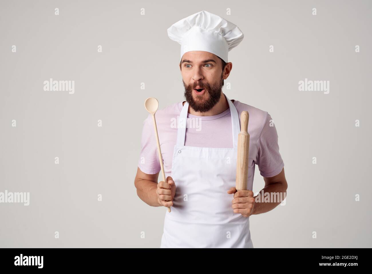 male chef in an apron walking professional cooking restaurant Stock ...