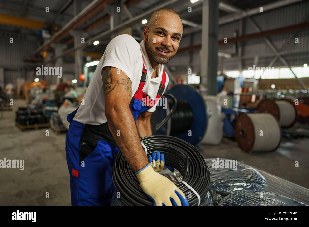 Portrait of a smiling handsome african american factory worker Stock ...