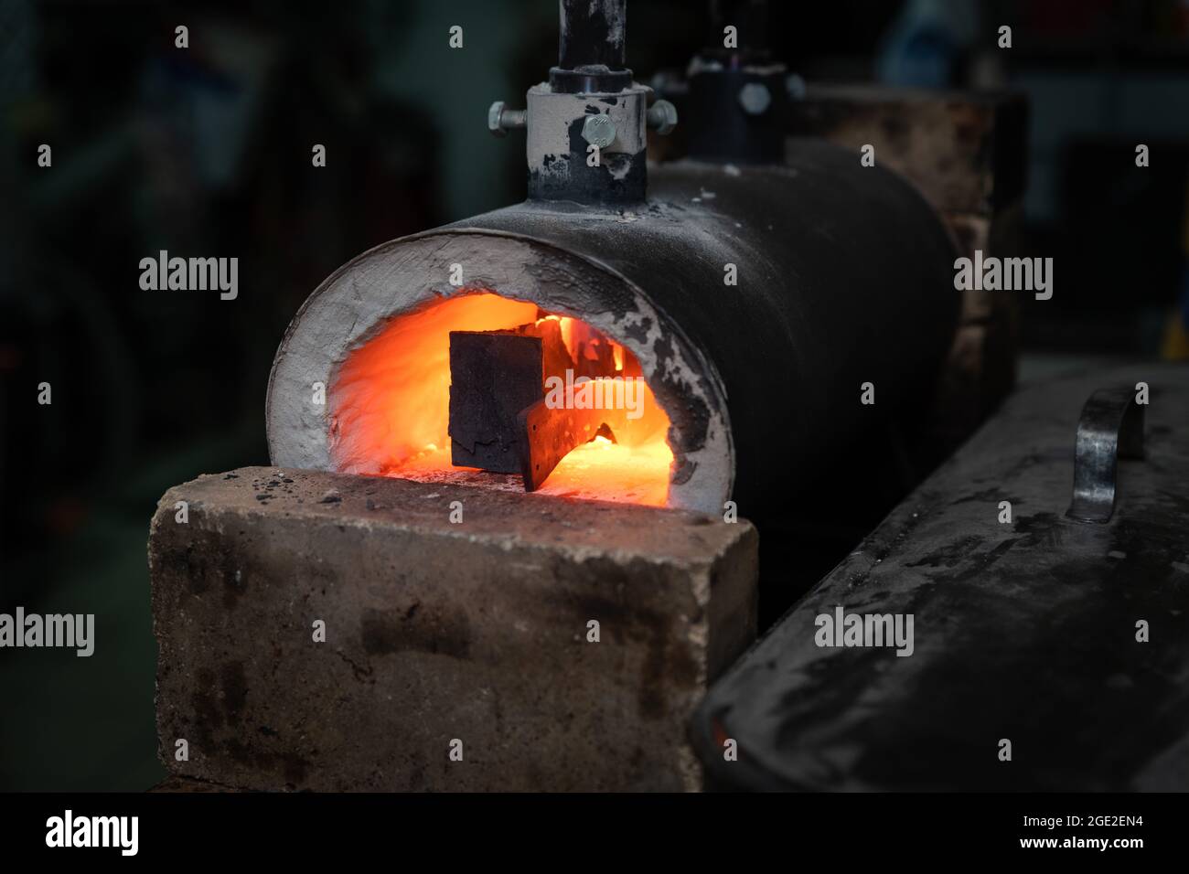 blacksmith forge with fire lit inside Stock Photo - Alamy