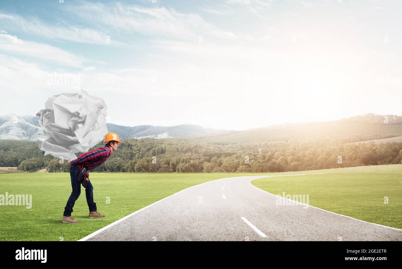 Engineer man carry load Stock Photo - Alamy